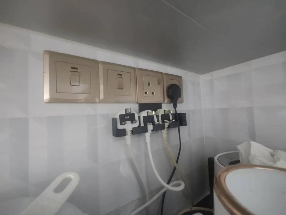 Socket-Secure Plug Hanger - Free 3D Print Model - MakerWorld