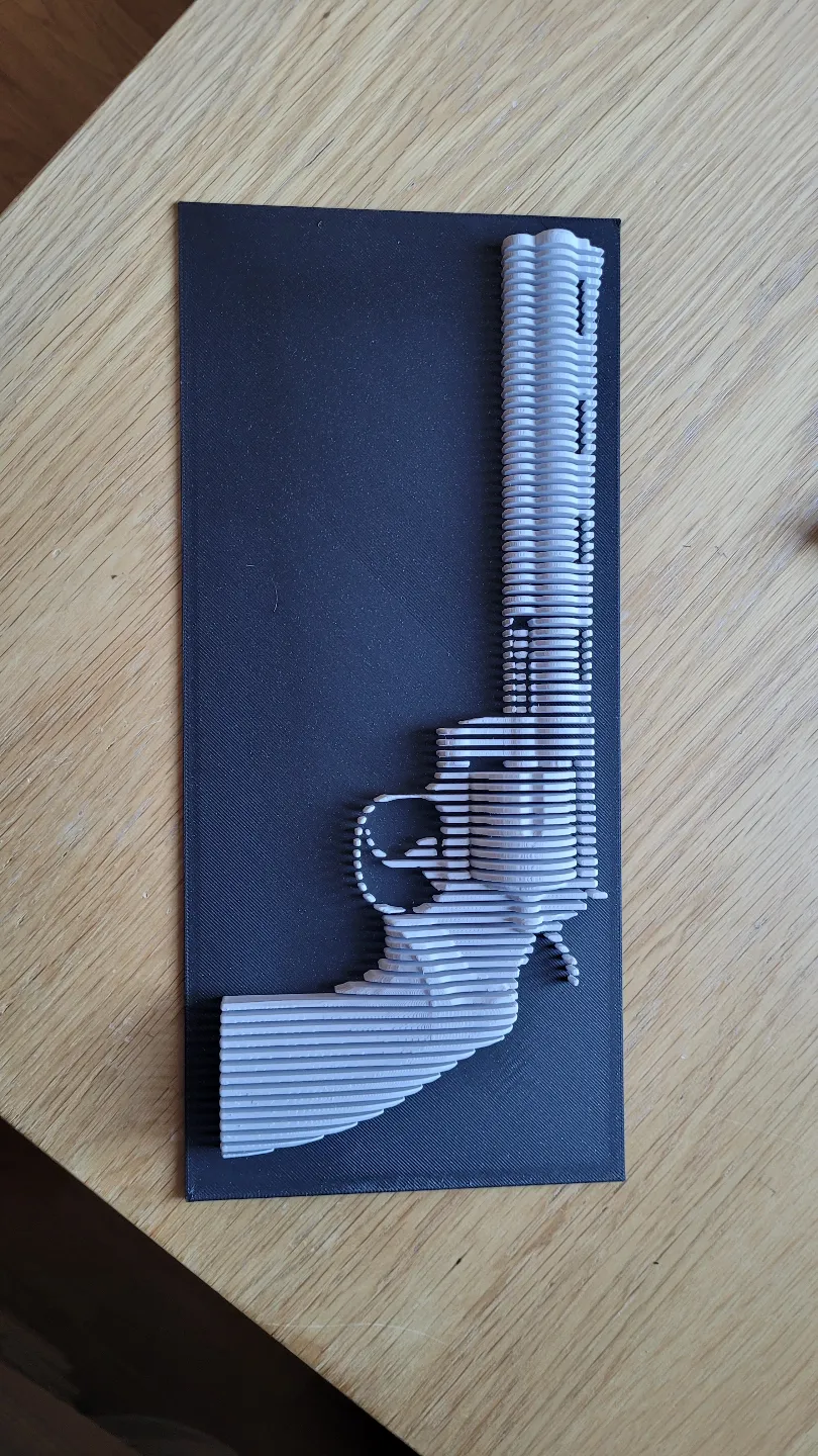 Revolver wall art by teletrollet - MakerWorld