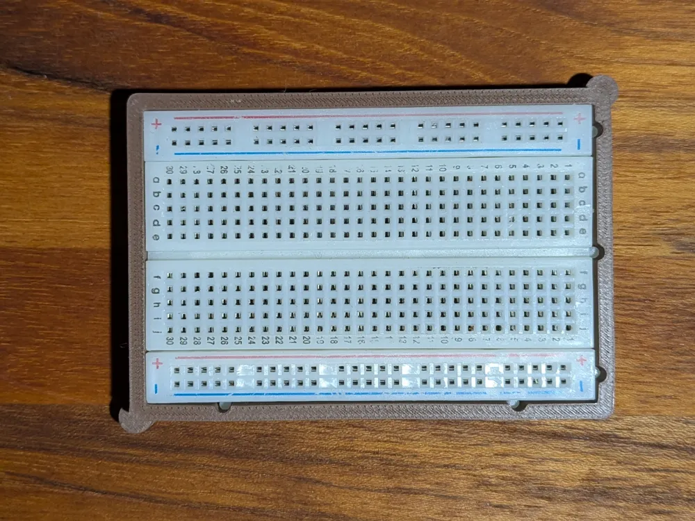 Small Breadboard Holder – Sleek and Functional by NuggetsInc - MakerWorld