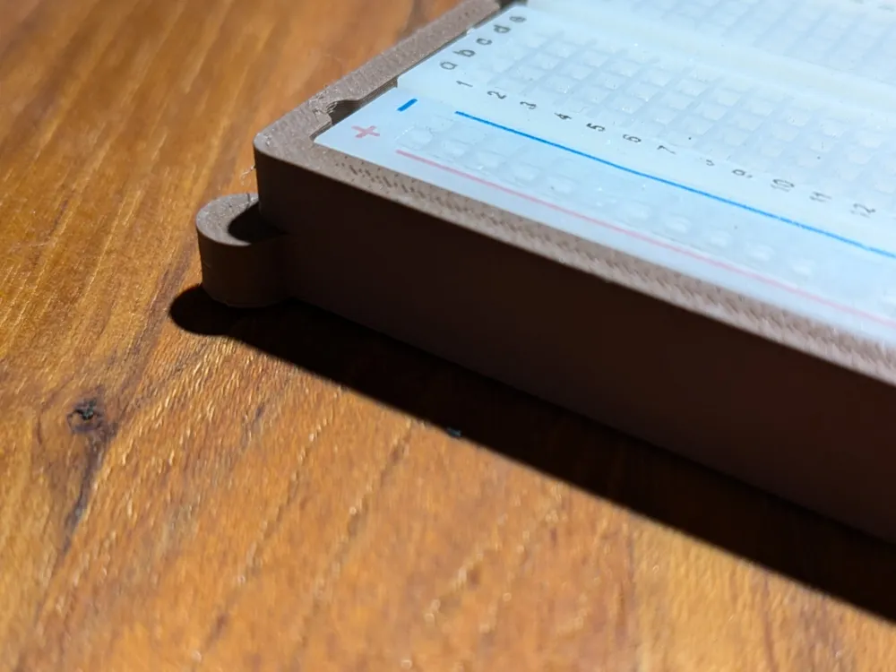 Small Breadboard Holder – Sleek and Functional by NuggetsInc - MakerWorld