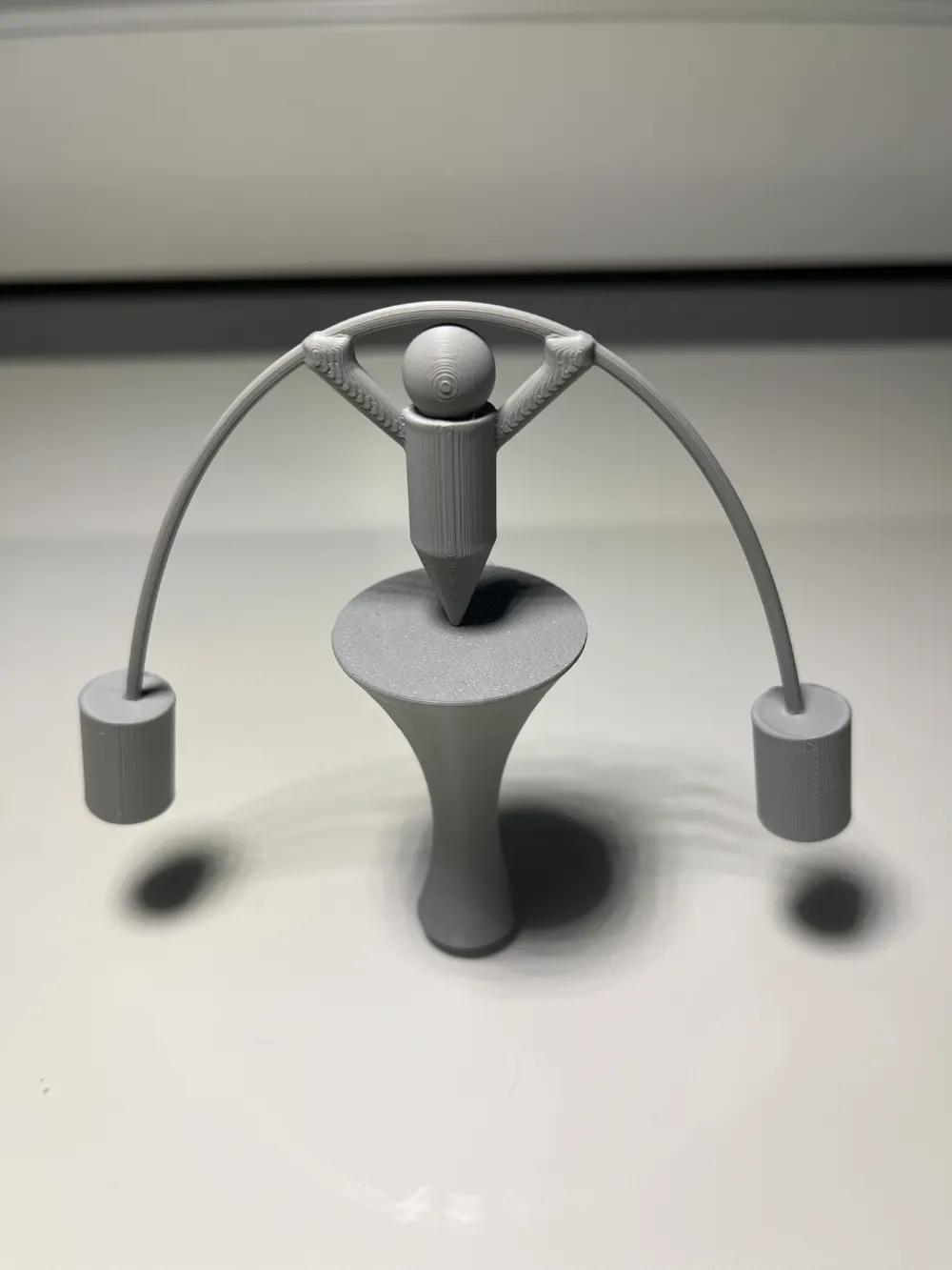 Balancing Man (demonstrating center of mass) by Arc3dprinting - MakerWorld