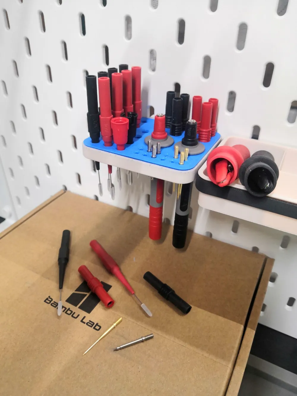 Probe organizer for a multimeter on a Skadis board by Karel J ...