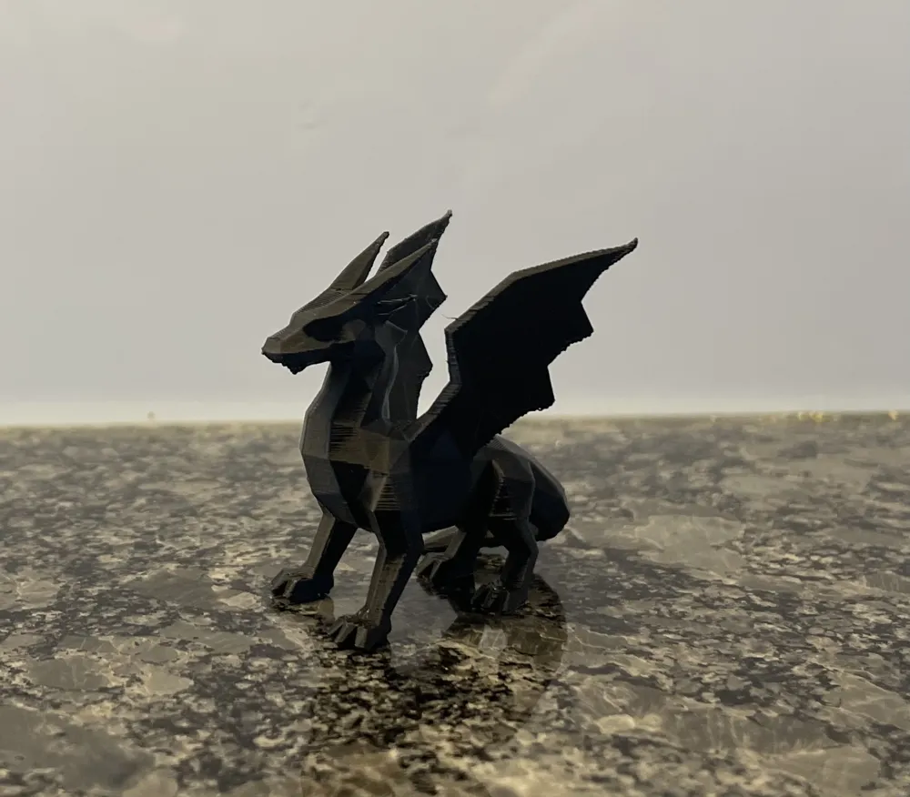 Low Poly Dragon Figurine by user name MakerWorld: Download Free 3D Models
