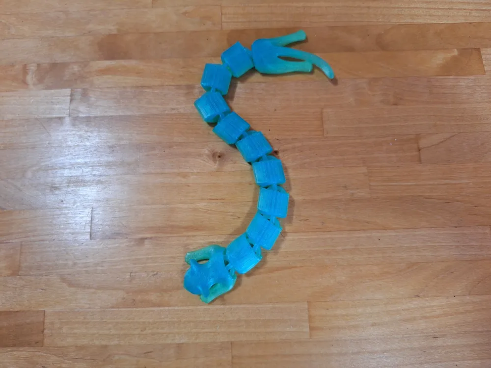 Flexi Cat - Free 3D Print Model - MakerWorld