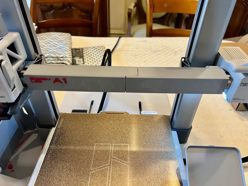 Bambu Lab A1 X-Axis Dust Cover in Two Parts by CrazyCrank - MakerWorld