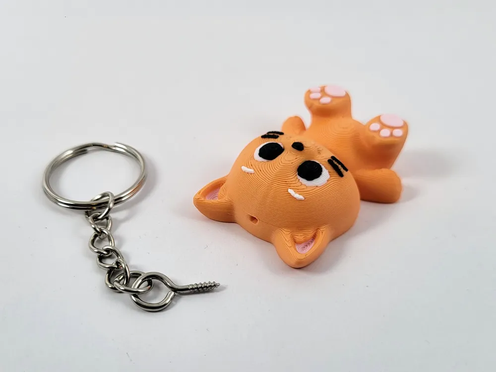 Flexi Cat – Magnet & Keychain - Free 3D Print Model - MakerWorld