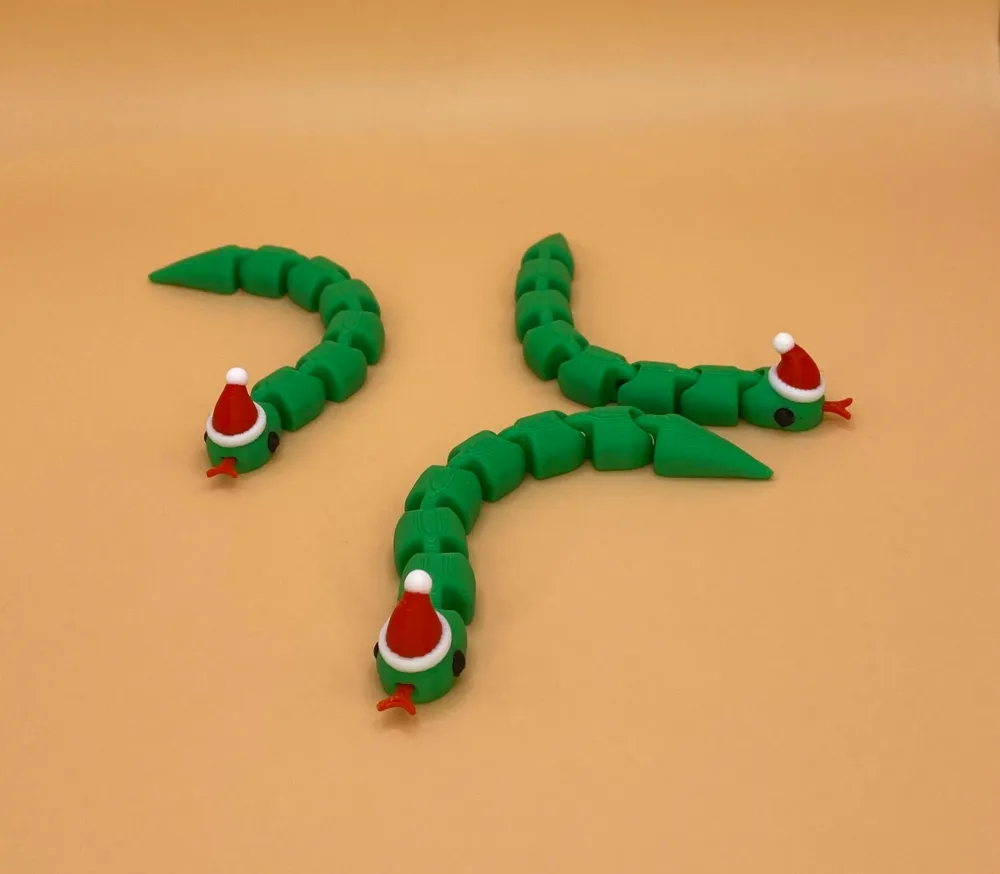 Articulated Christmas Snake - Santa Hat by Waffles - MakerWorld