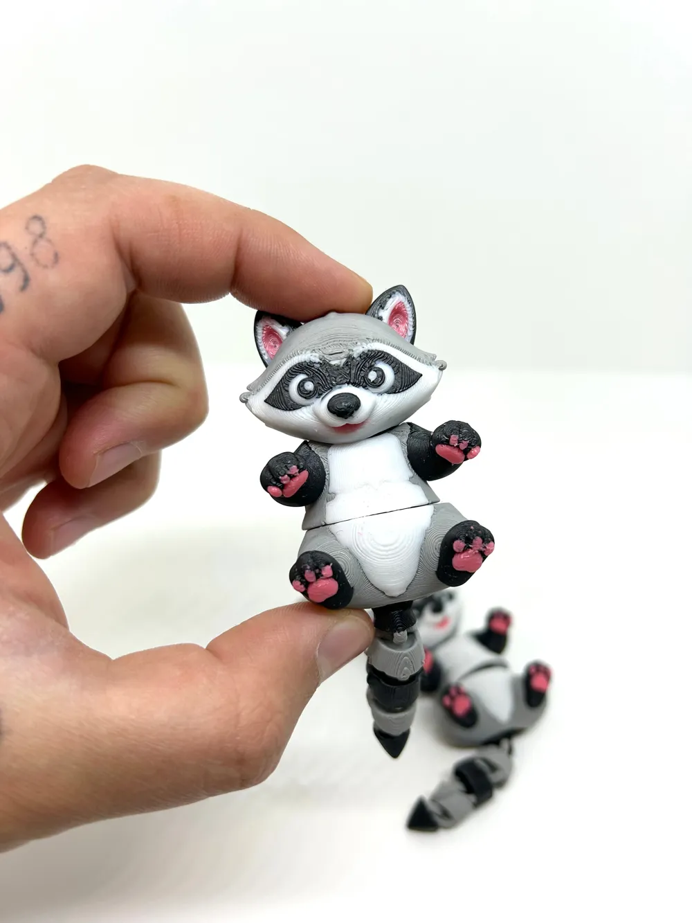 Flexi raccoon - Toy/Keychain - Free 3D Print Model - MakerWorld