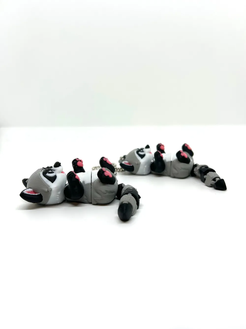 Flexi raccoon - Toy/Keychain - Free 3D Print Model - MakerWorld