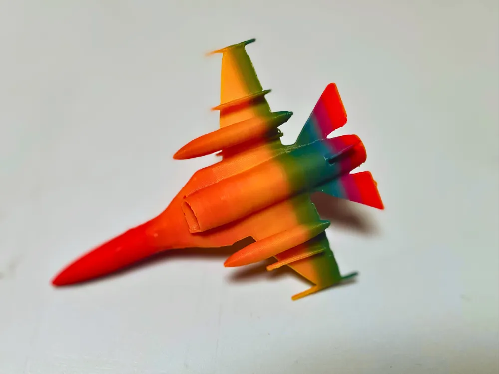 Cool rainbow fighter jet in flight pose, 30-minute print time by ...