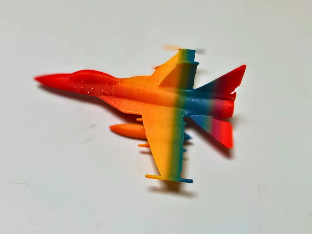 Cool rainbow fighter jet in flight pose, 30-minute print time by ...