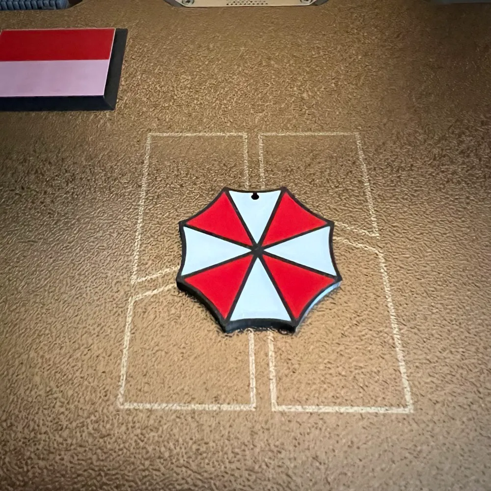 Resident Evil - Umbrella Corporation keychain by Nirolfix - MakerWorld