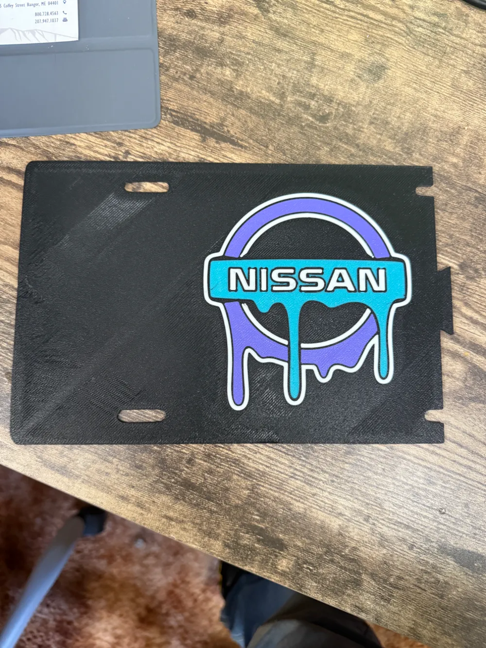 dripping nissan logo license plate - Free 3D Print Model - MakerWorld