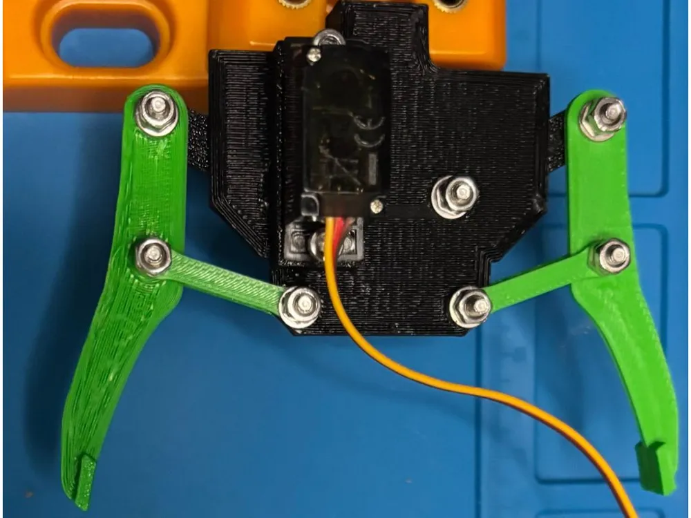 3D Printed Servo Gripper - Free 3D Print Model - MakerWorld