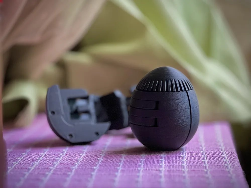 Yolk Grip - Foldable Egg-Shaped Smartphone Handle by weirdeetz - MakerWorld