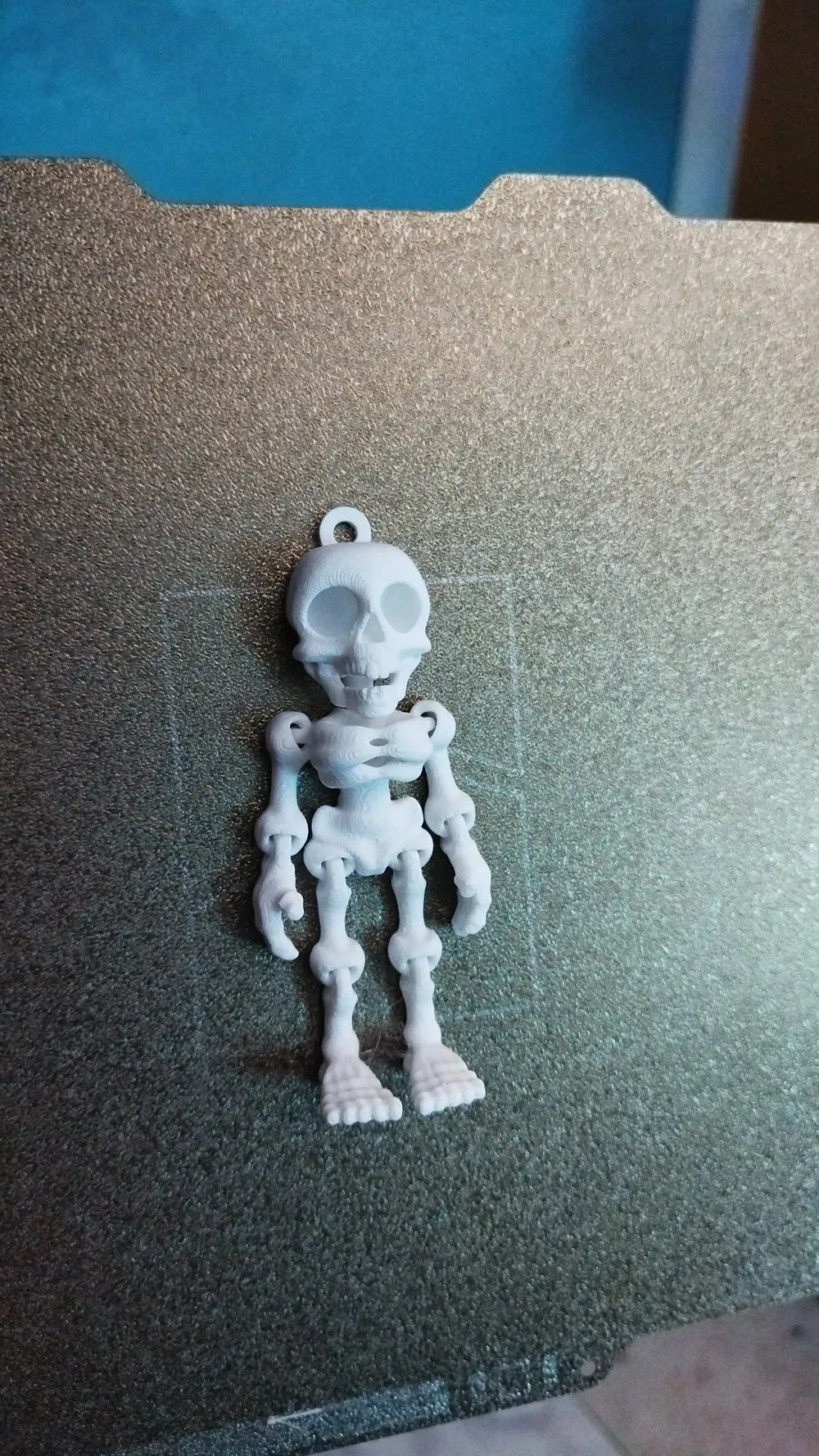 Flexi Skeleton Smile Keychain - Free 3D Print Model - MakerWorld