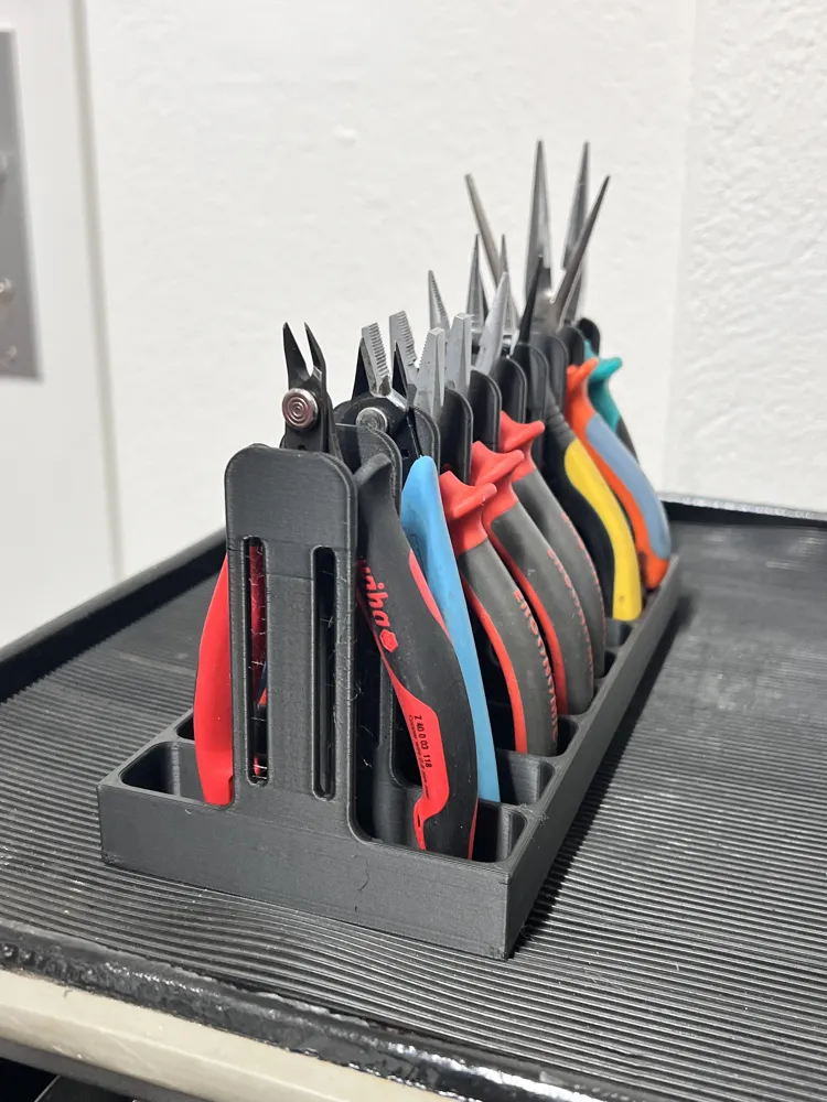 9‑Pliers Desk Rack fast print - Free 3D Print Model - MakerWorld