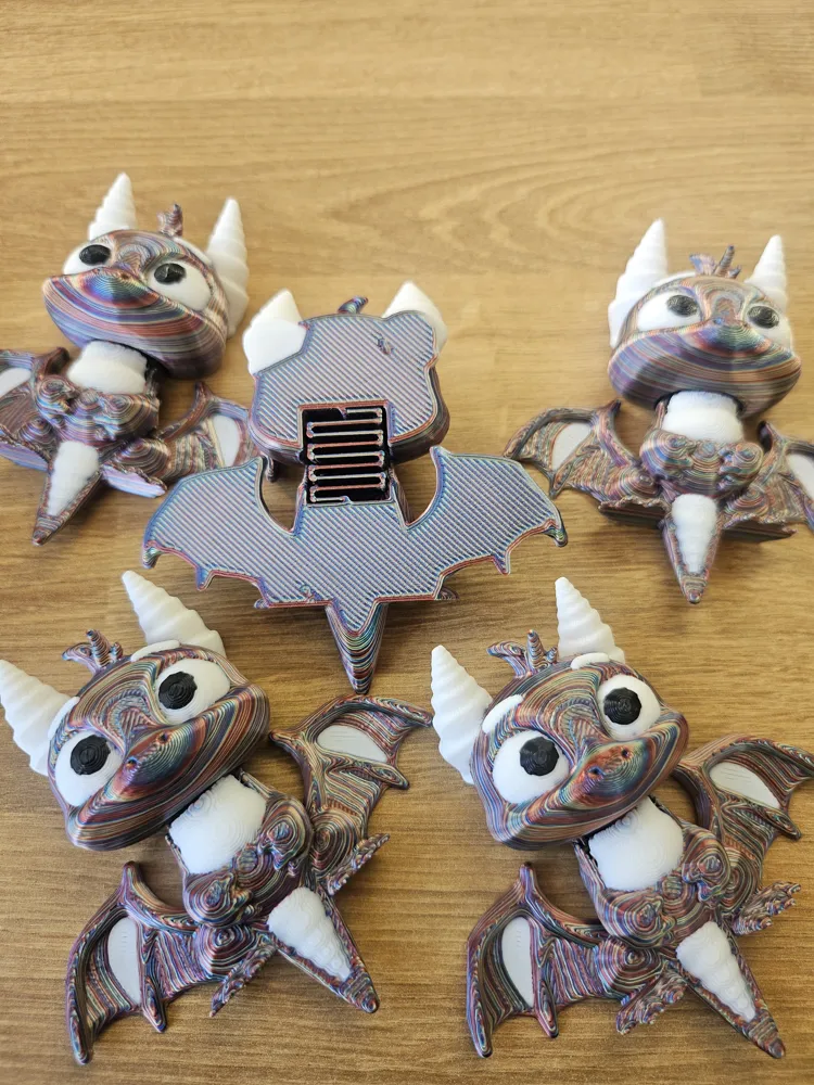 cute bobblehead baby dragon flexi by MadMonkey3D MakerWorld: Download Free 3D Models