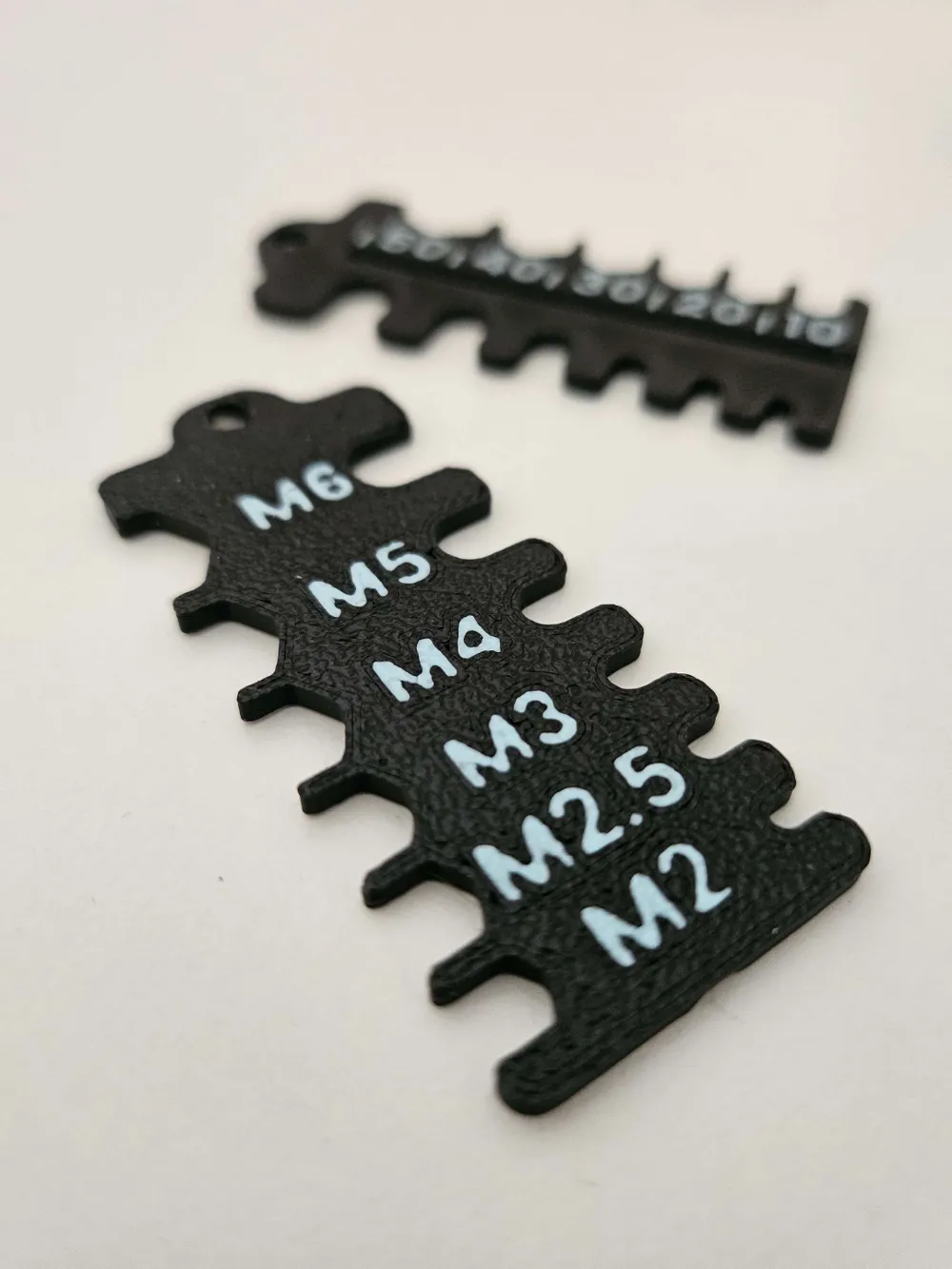 Metric Screw Keychain by noahsleepy - MakerWorld