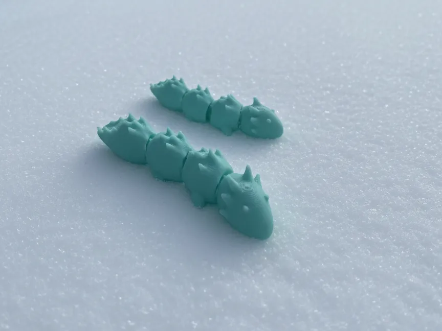 Mini Articulated Ice Dragon - Free 3D Print Model - MakerWorld
