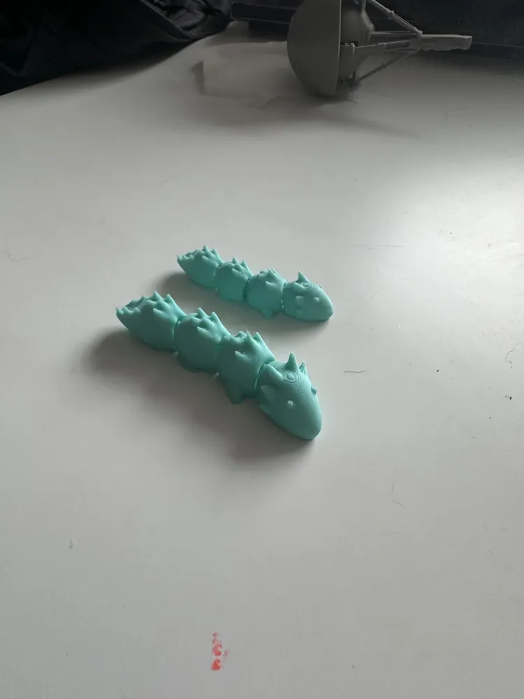 Mini Articulated Ice Dragon - Free 3D Print Model - MakerWorld