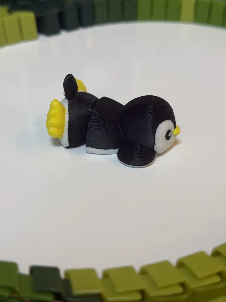 Sliding Penguin Flexi Fidget Mini - Free 3D Print Model - MakerWorld