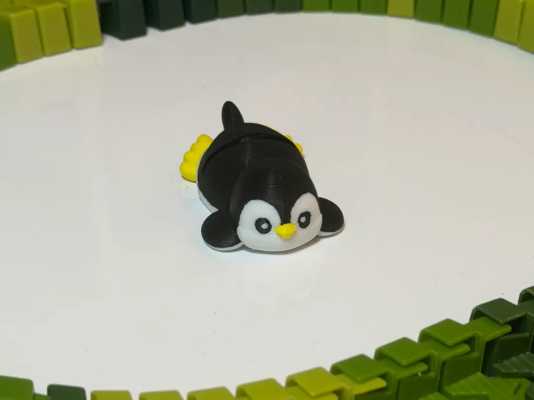 Sliding Penguin Flexi Fidget Mini - Free 3D Print Model - MakerWorld
