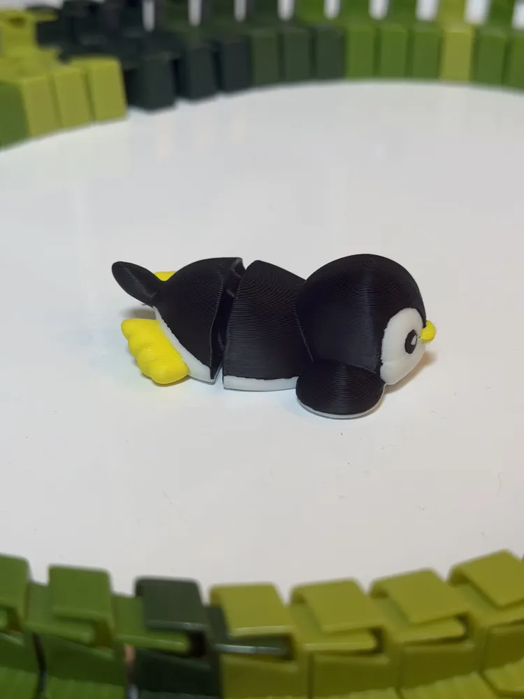 Sliding Penguin Flexi Fidget Mini - Free 3D Print Model - MakerWorld