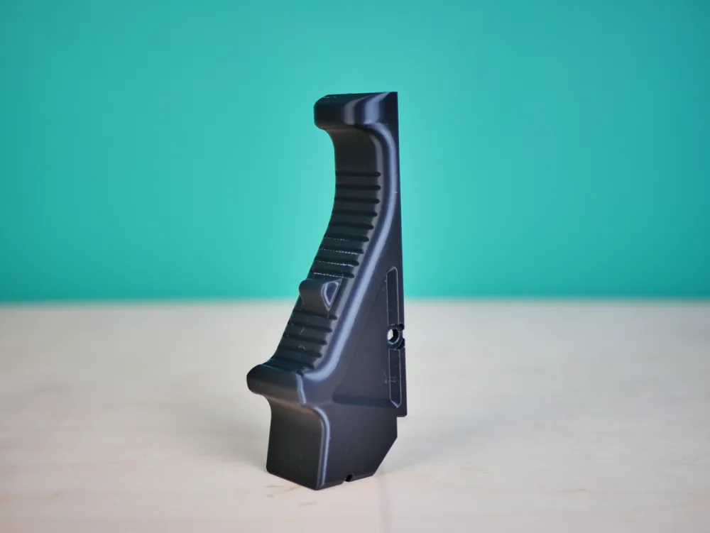 Angled foregrip with cable tidy hole by OpenShot MakerWorld: Download ...