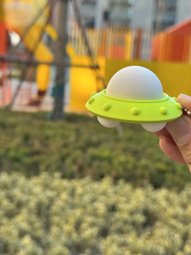 UFO Clicker Keychain - Free 3D Print Model - MakerWorld