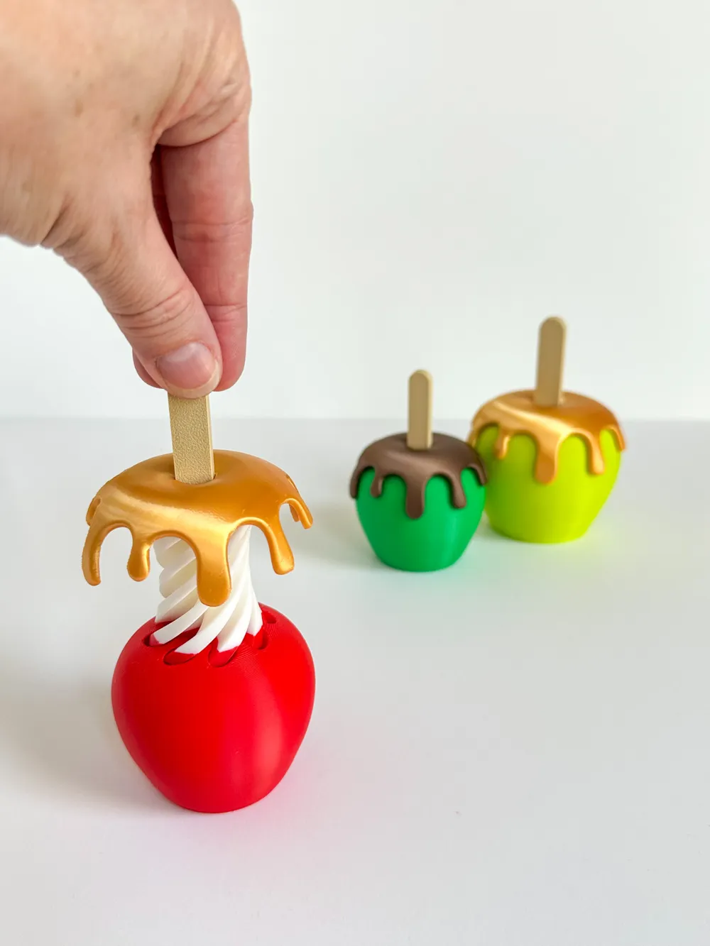 Caramel Apple Pass Through Fidget - Free 3D Print Model - MakerWorld