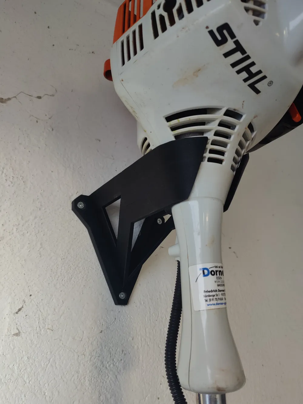 Stihl FS trimmer mount/wall mount/holder - Free 3D Print Model - MakerWorld