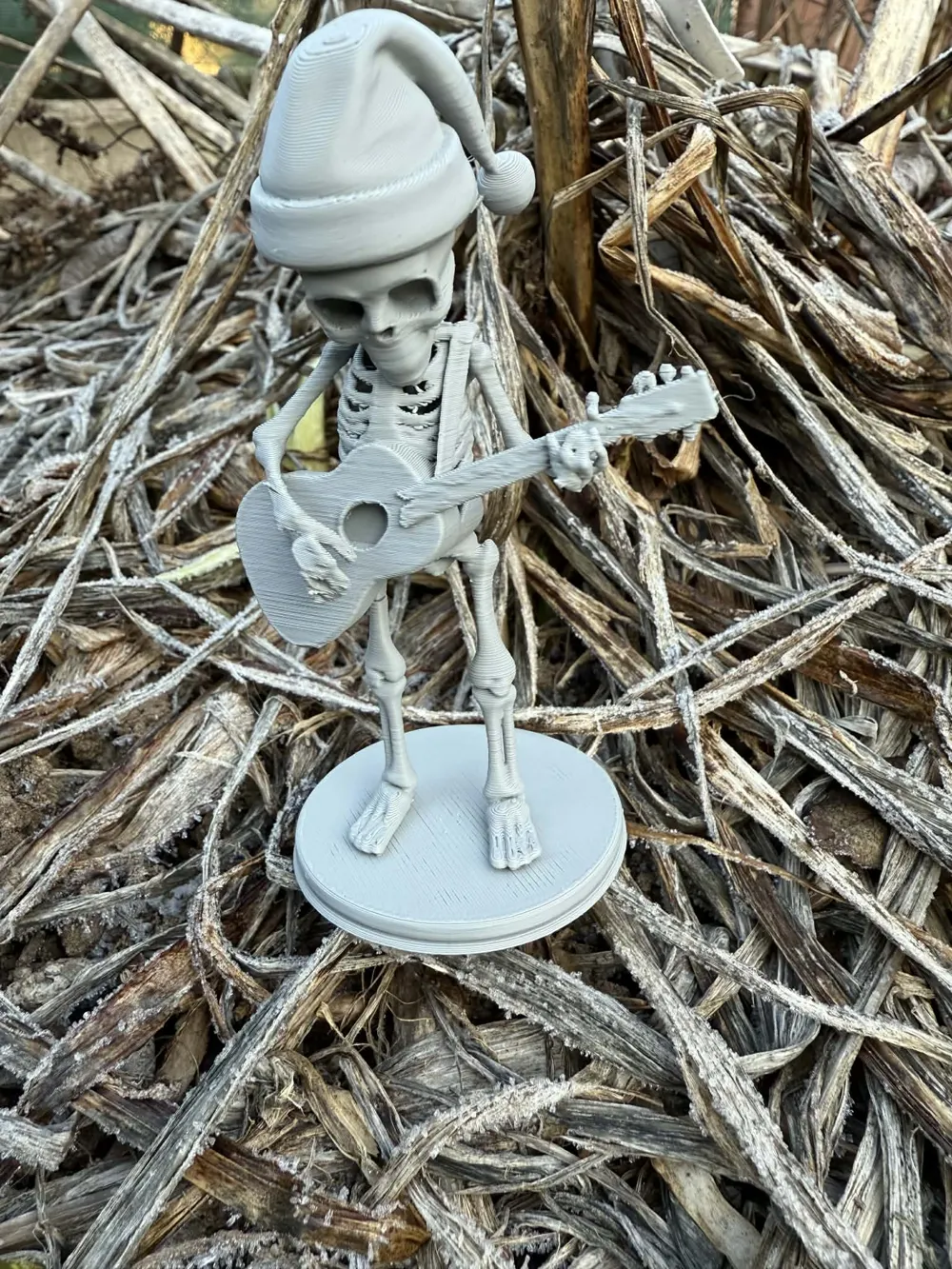 Winter skeleton with guitar on stand - Free 3D Print Model - MakerWorld
