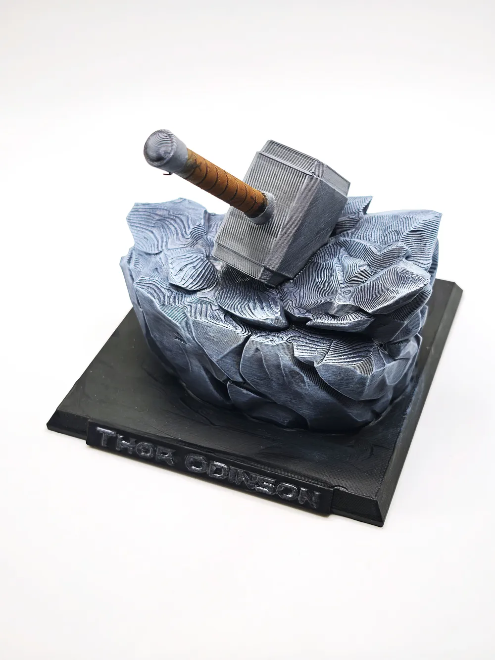 Thor Mjolnir on Stone - Free 3D Print Model - MakerWorld