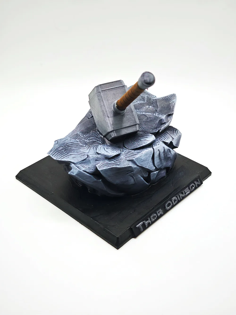 Thor Mjolnir on Stone - Free 3D Print Model - MakerWorld