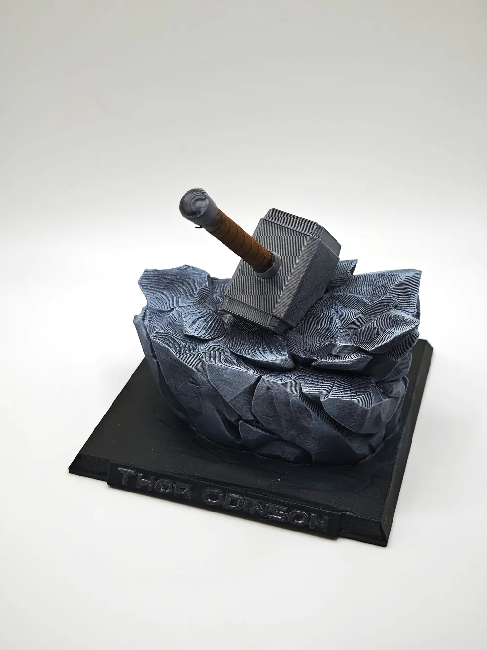 Thor Mjolnir on Stone - Free 3D Print Model - MakerWorld
