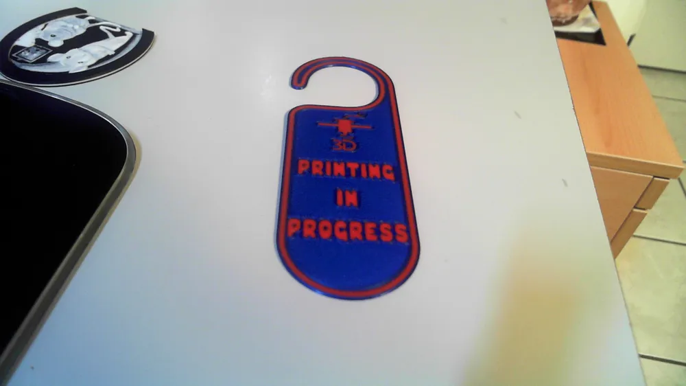 Printing in progress Door Hanger by Michele MM3D - MakerWorld