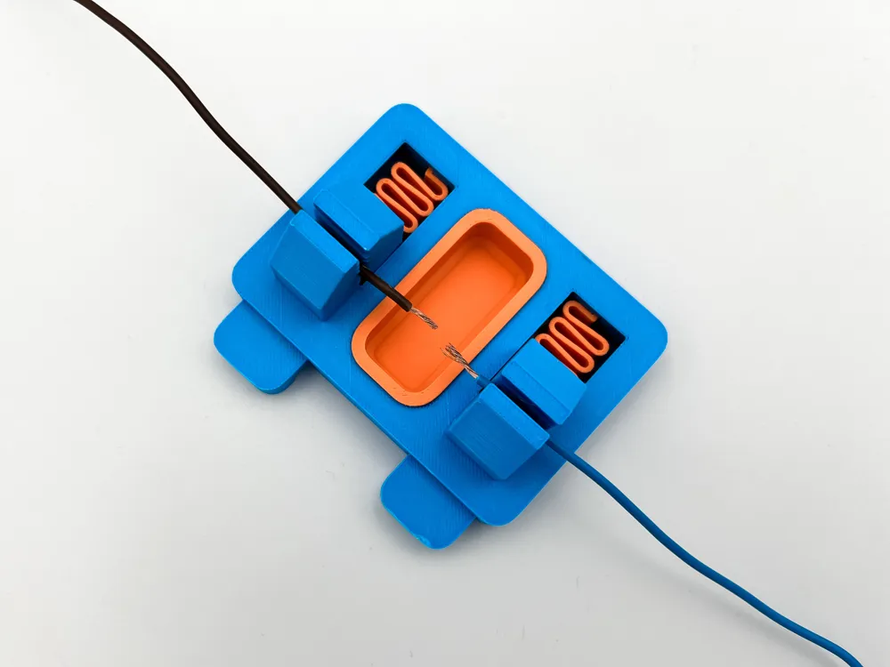 Wire Holder by Polymeria - Free 3D Print Model - MakerWorld