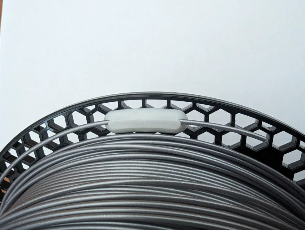 Prusament Spool Clip (stays on spool!) by Alex and Tonic 3D - MakerWorld