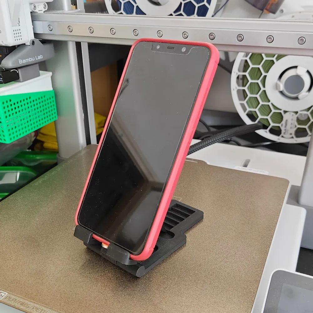 Adjustable Foldable Phone Stand - Free 3D Print Model - MakerWorld