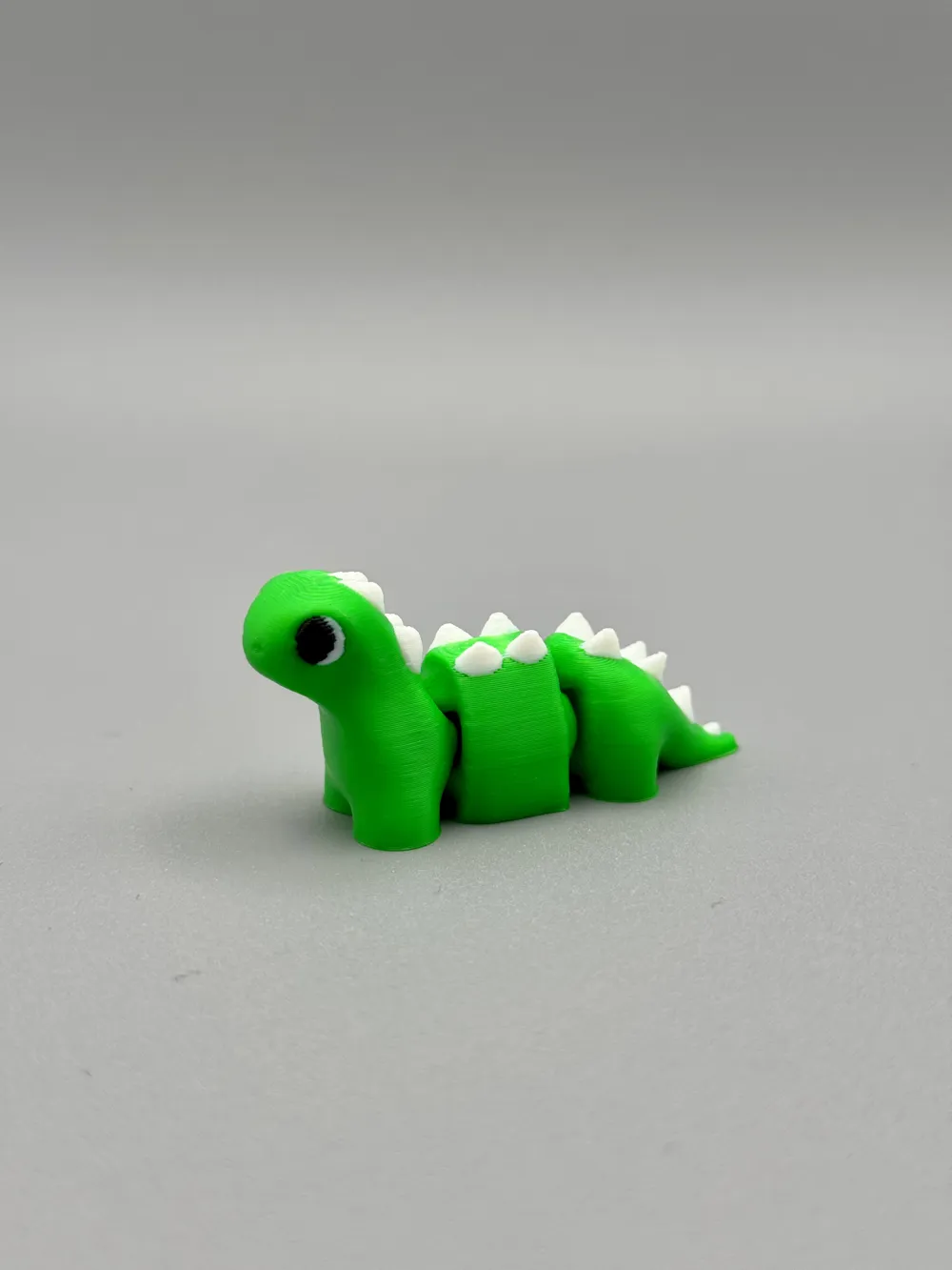 Stegosaurus mini fidget dinosaur by Folk & Forge MakerWorld: Download ...