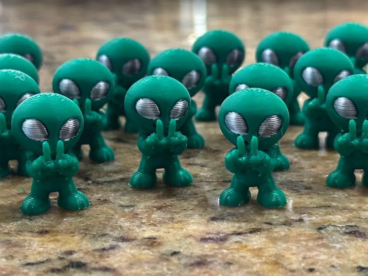 Mini Aliens holding 11 - Free 3D Print Model - MakerWorld