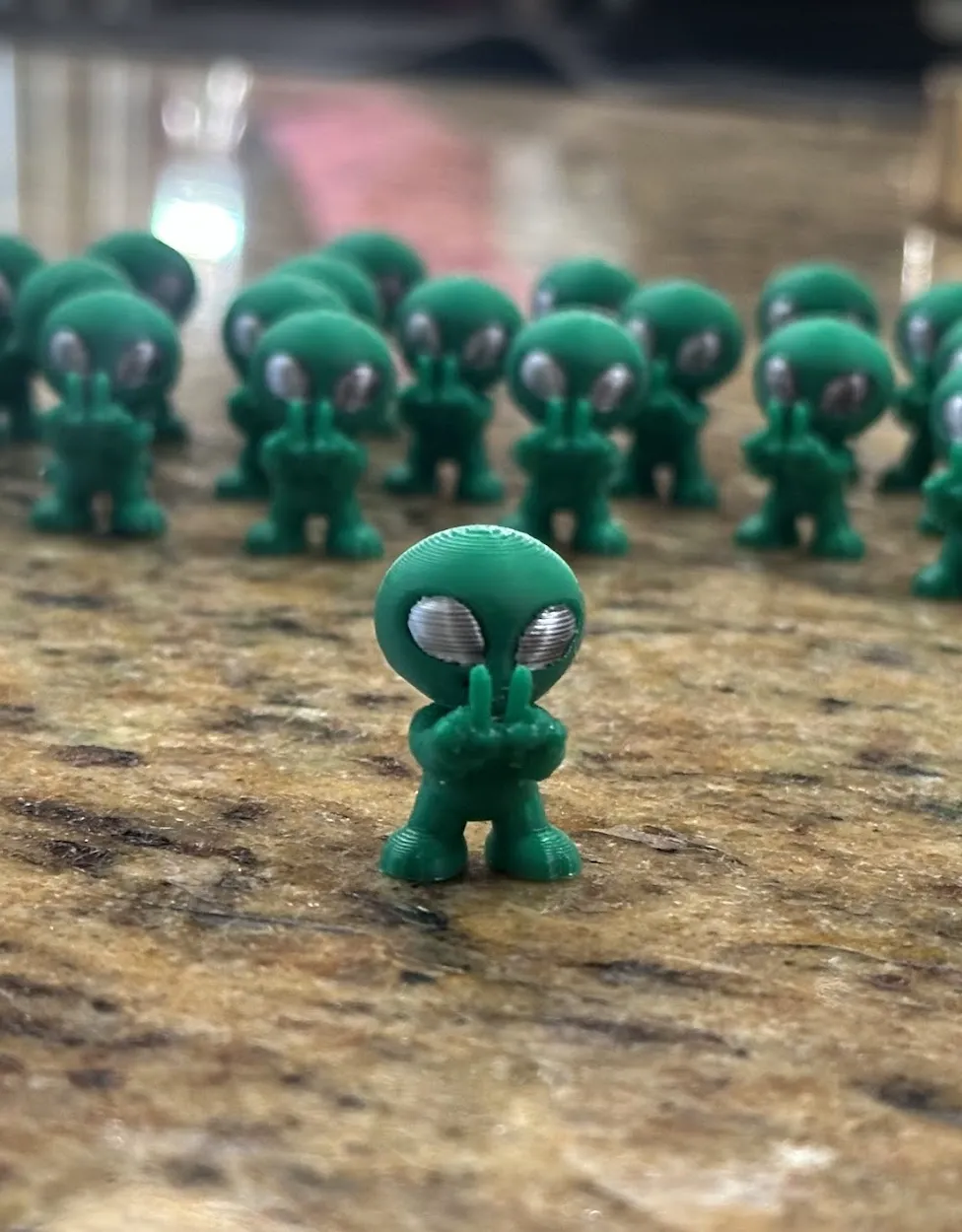 Mini Aliens holding 11 - Free 3D Print Model - MakerWorld