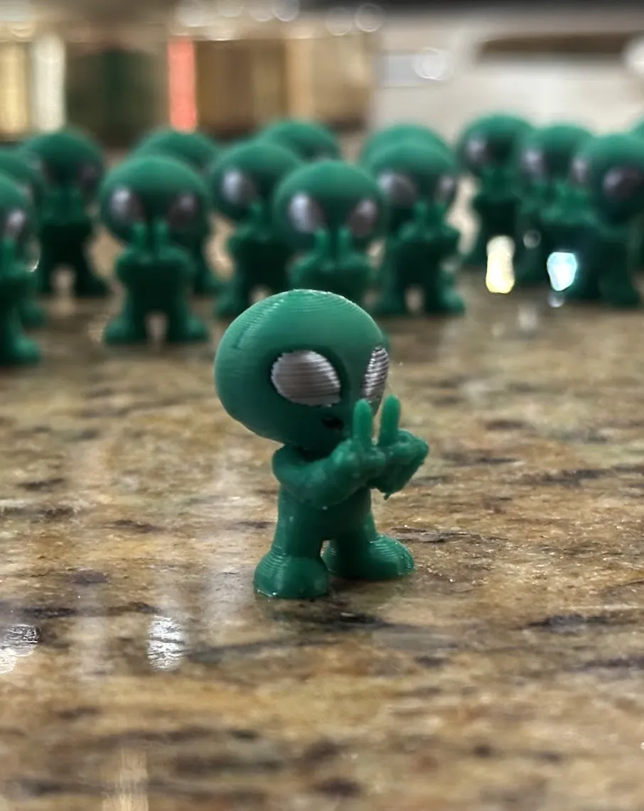 Mini Aliens holding 11 - Free 3D Print Model - MakerWorld
