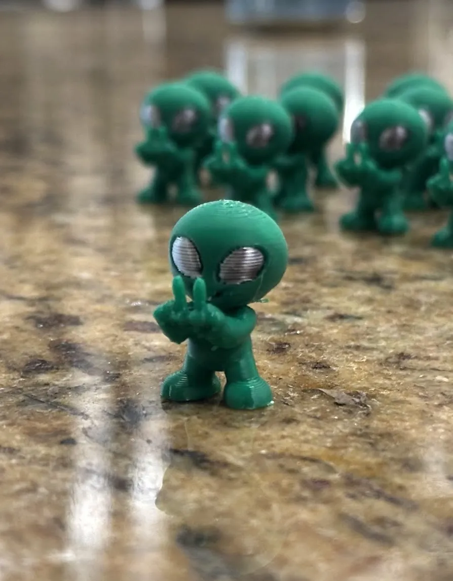 Mini Aliens holding 11 - Free 3D Print Model - MakerWorld
