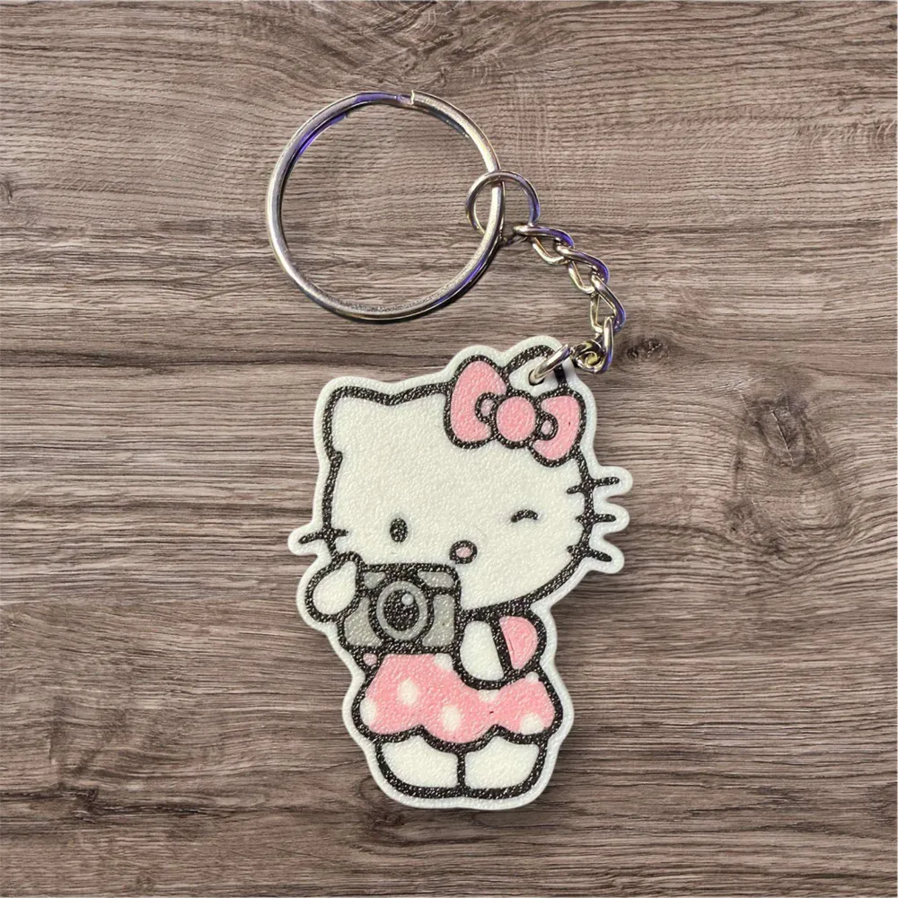 Hello Kitty Holding Camera Keychain by Munark MakerWorld: Download Free ...
