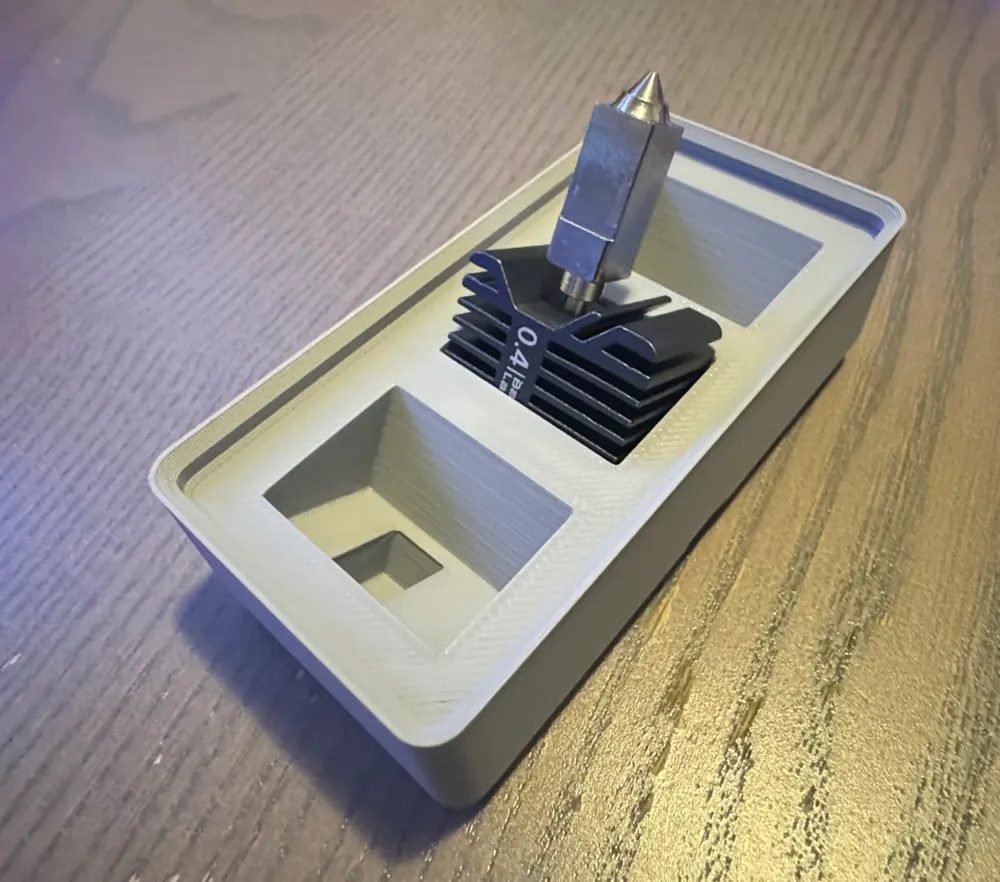 Bambu Spare Nozzle Storage - Gridfinity 1x2x2 by JamesRagnar - MakerWorld