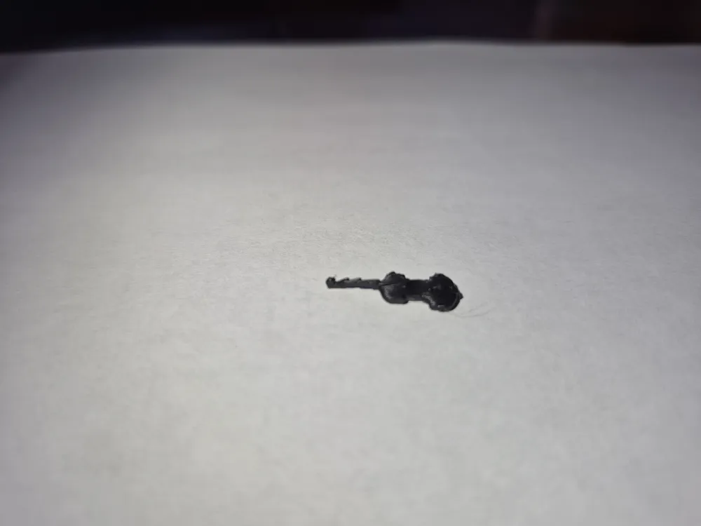 The Worlds Smallest Violin - Free 3D Print Model - MakerWorld