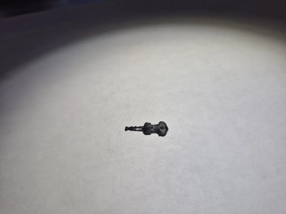 The Worlds Smallest Violin - Free 3D Print Model - MakerWorld