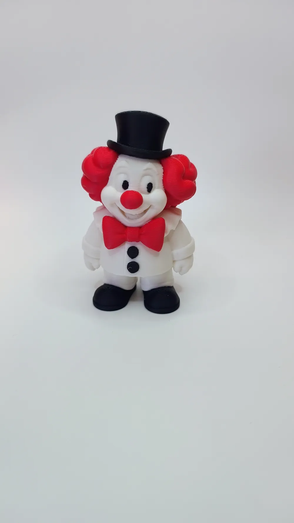 Circus Smiler "Giggles" with Top Hat - Free 3D Print Model - MakerWorld